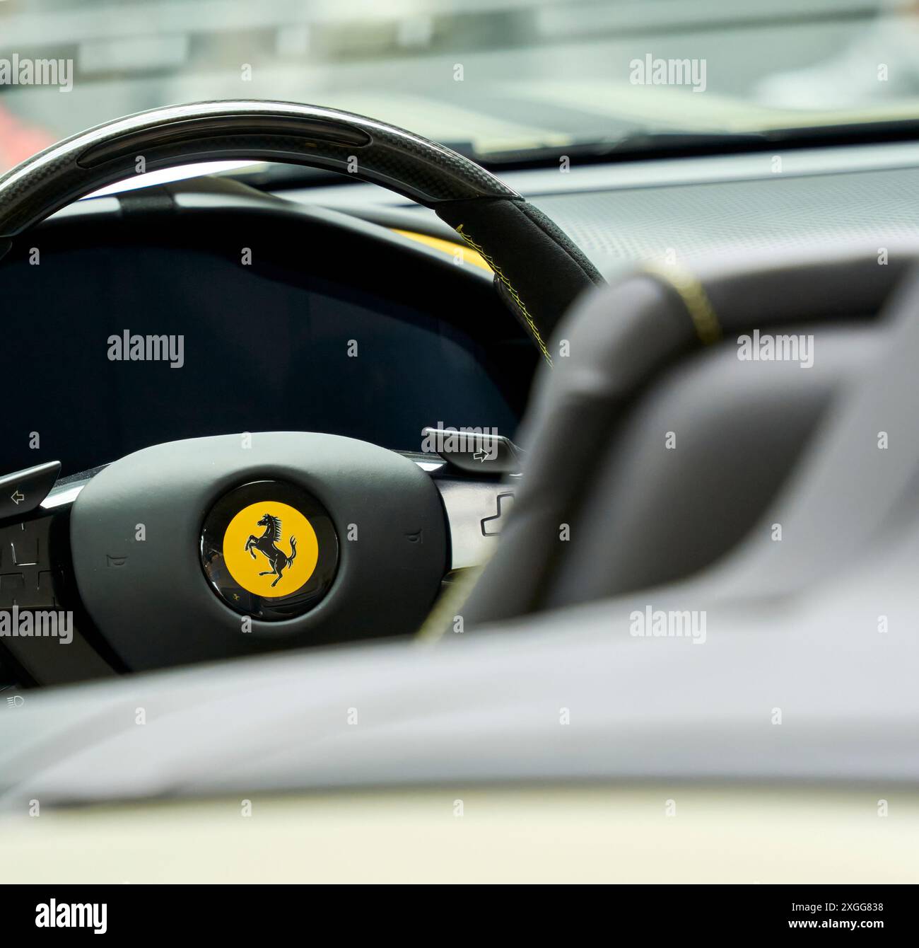 Ferrari emblem with rearing black horse on the steering wheel of the ...