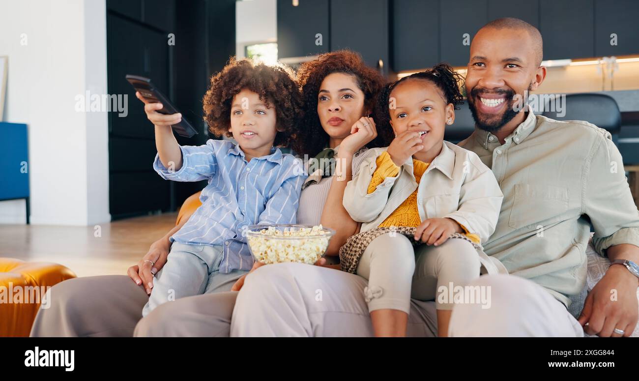 Family, kids and watching tv together in home for bonding, streaming ...