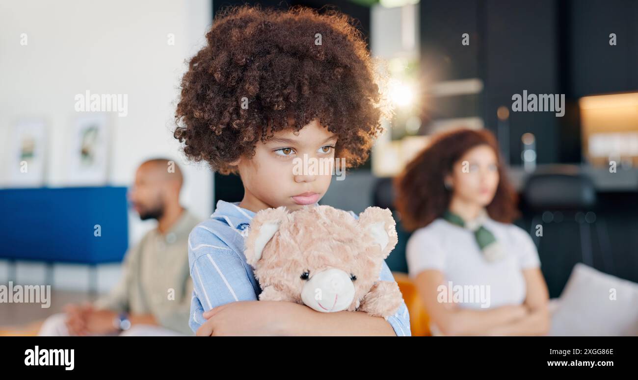 Divorce, parents conflict and child with teddy bear in home for ...