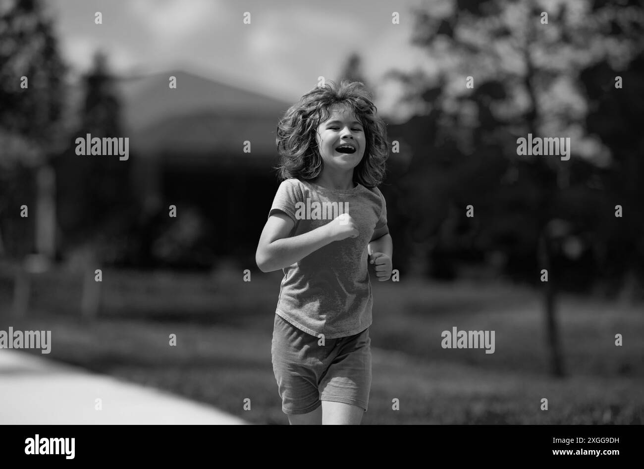 Kid running in summer street. Child enjoy run. Little boy running on ...