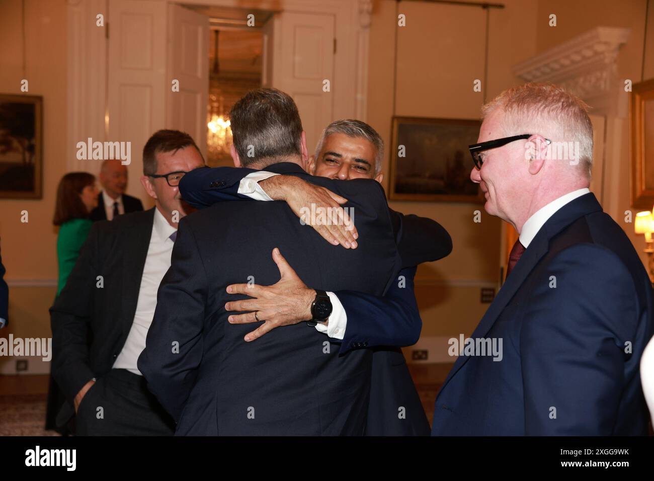Prime Minister Sir Keir Starmer hugs Mayor of London Sadiq Khan, during ...