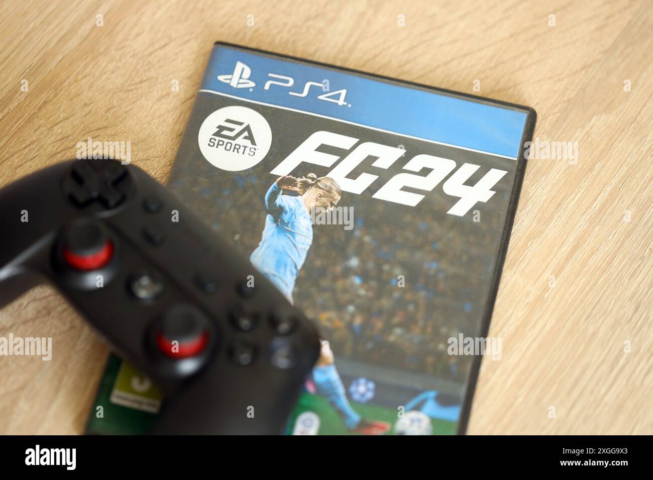 KYIV, UKRAINE - JUNE 26, 2024 FC24 Fifa soccer PS4 video game disc box ...