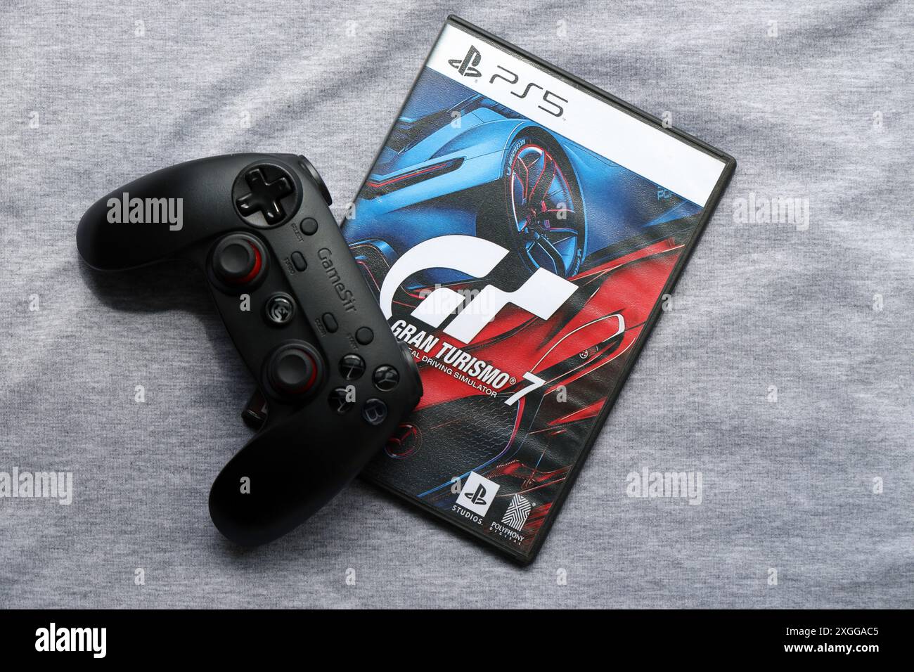 KYIV, UKRAINE - JUNE 26, 2024 Gran Turismo 7 PS5 video game disc box ...