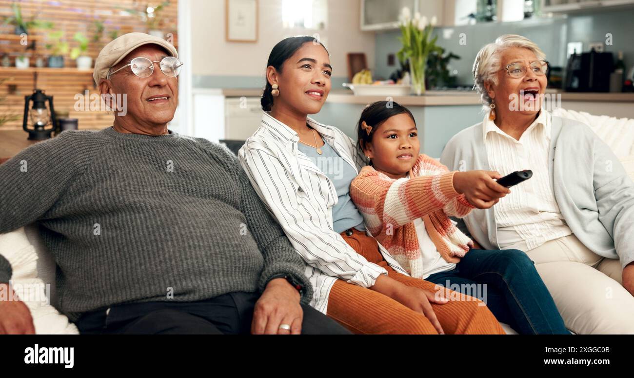 Big family, relax and watching tv in home together for comedy movie ...