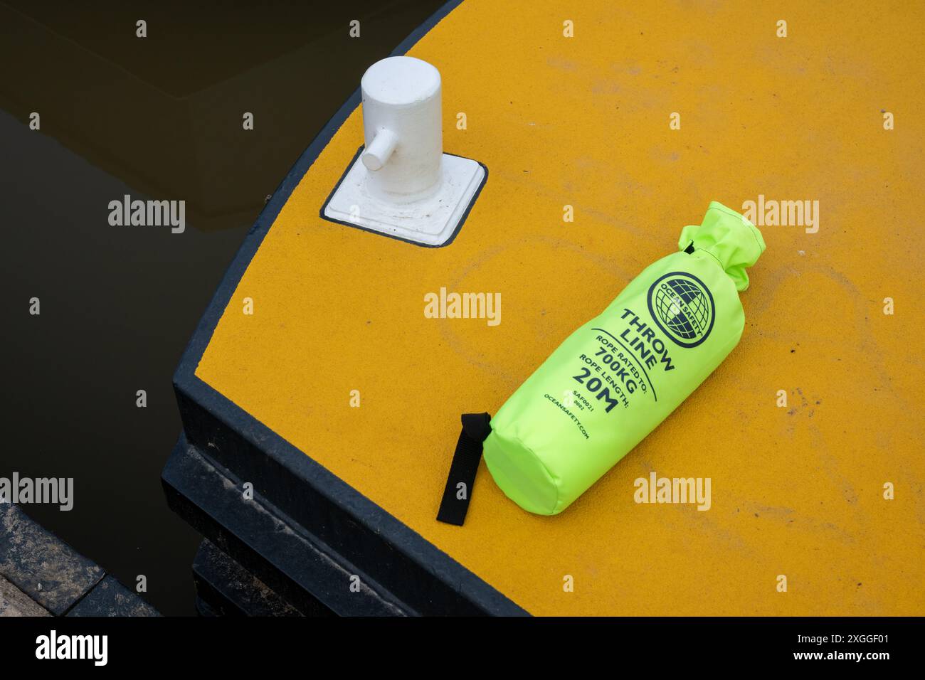 An Ocean Safety throw line in a bright yellow bag on the yellow ...