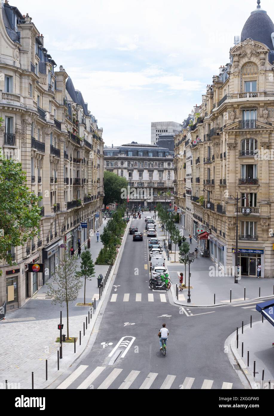 Paris, France 07.05.2024. A typical Parisian street with Haussmannian ...