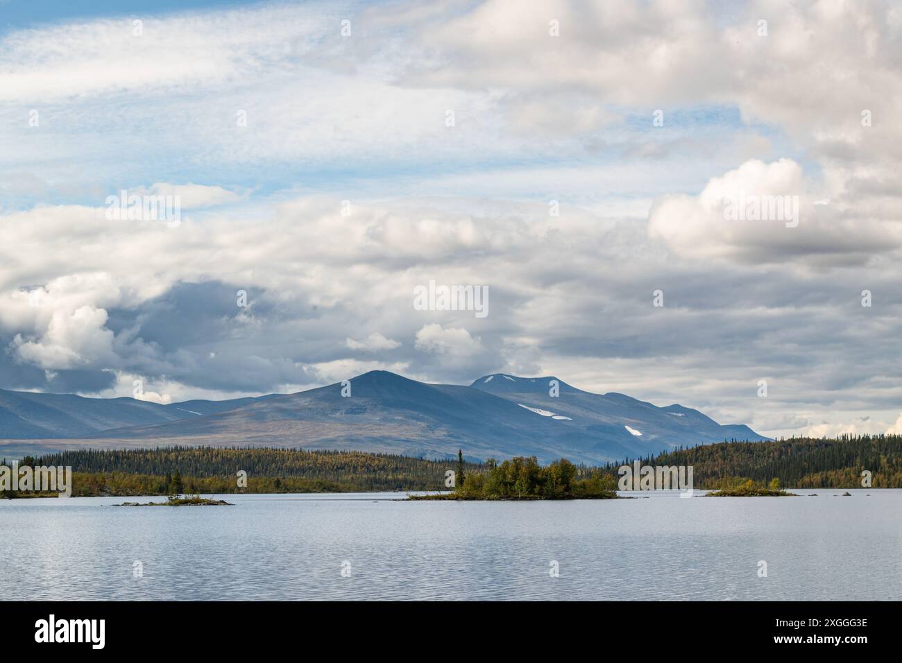 The crystal clear lake on a hiking trail Kungsleden in northern Sweden ...