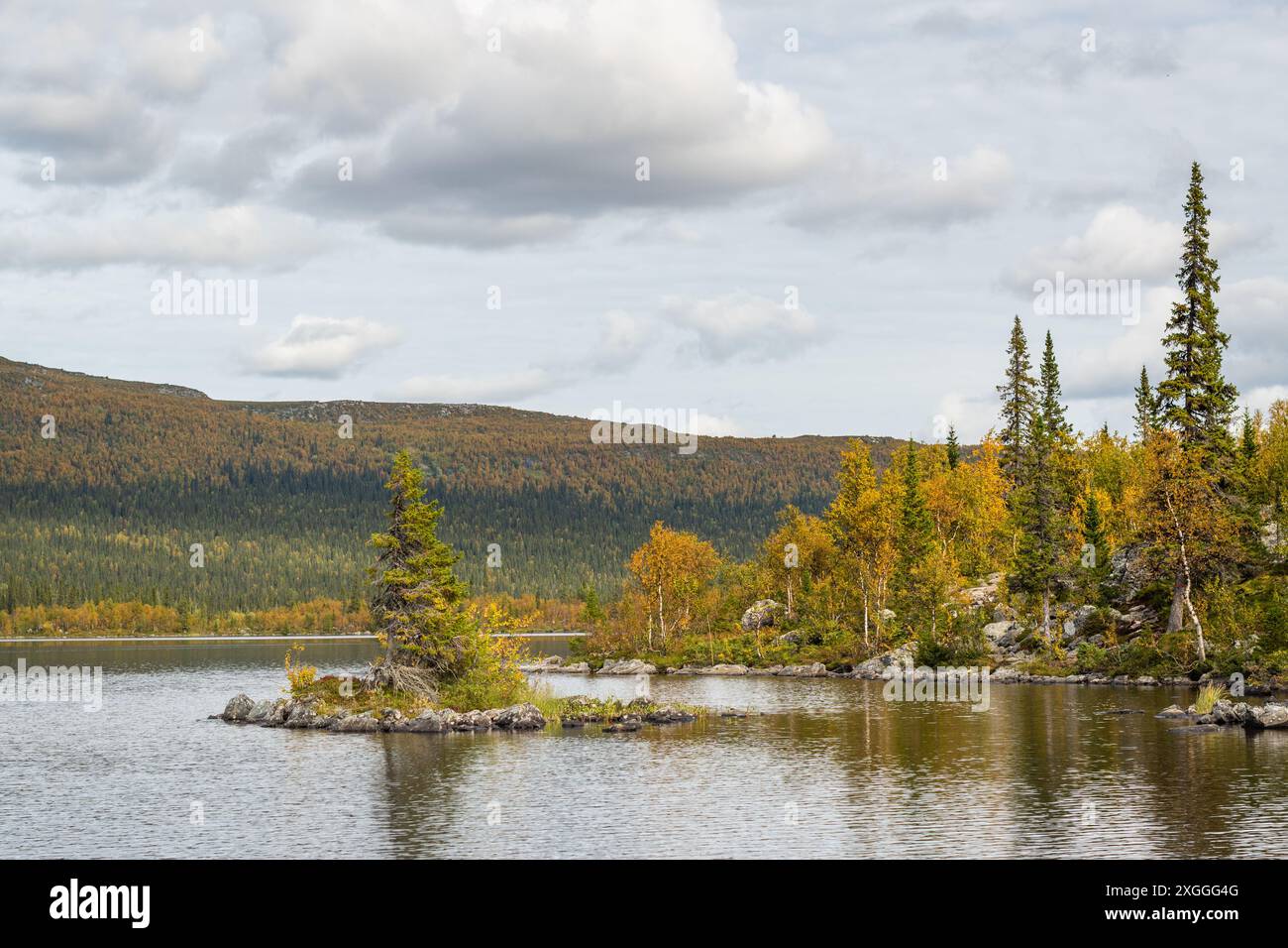 The crystal clear lake on a hiking trail Kungsleden in northern Sweden ...