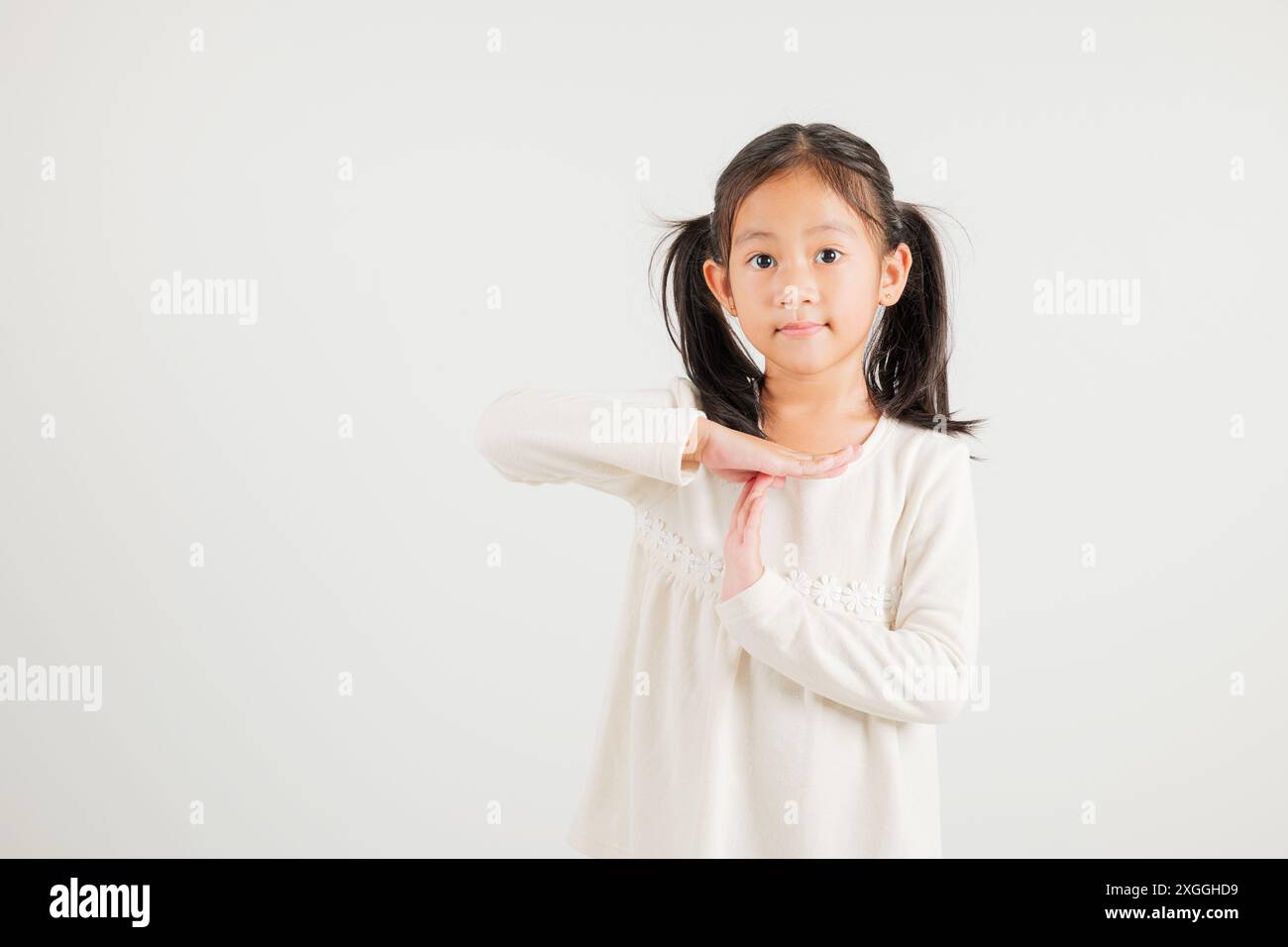 Closeup portrait young kid girl smiling making give time out gesture ...