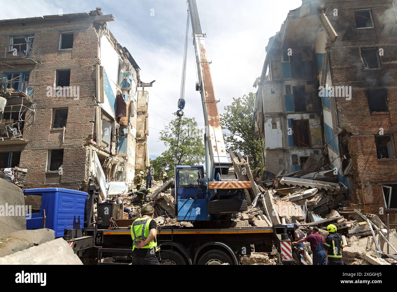 KYIV, UKRAINE - JULY 8, 2024 - Rescuer workers remove the rubble at a ...