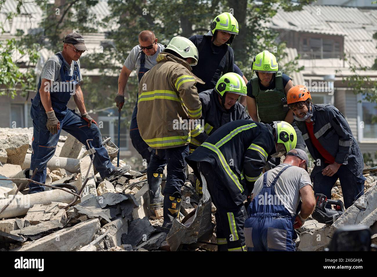 KYIV, UKRAINE - JULY 8, 2024 - Rescuer workers remove the rubble at a ...