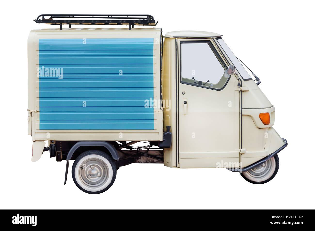 Side view of a vintage Italian three wheeled scooter van isolated on a ...