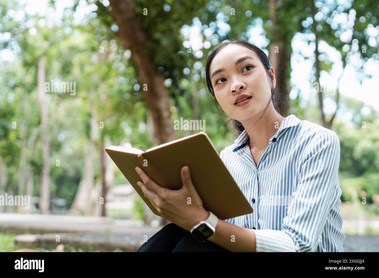 Young Digital Nomad Enjoying Outdoor Work Environment with Laptop and ...