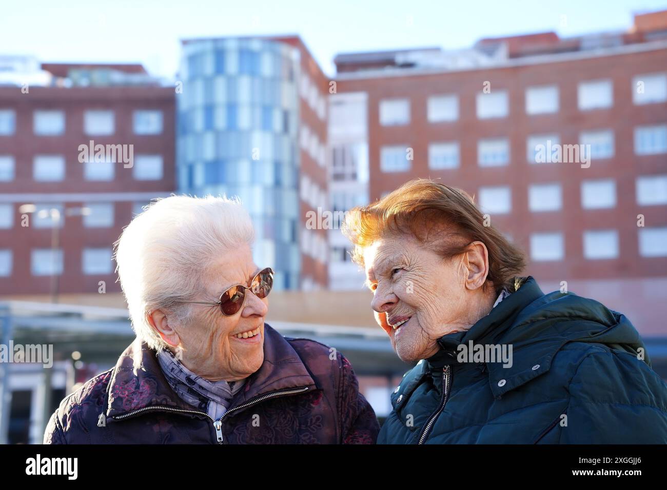 Two older women standing outside hi-res stock photography and images ...