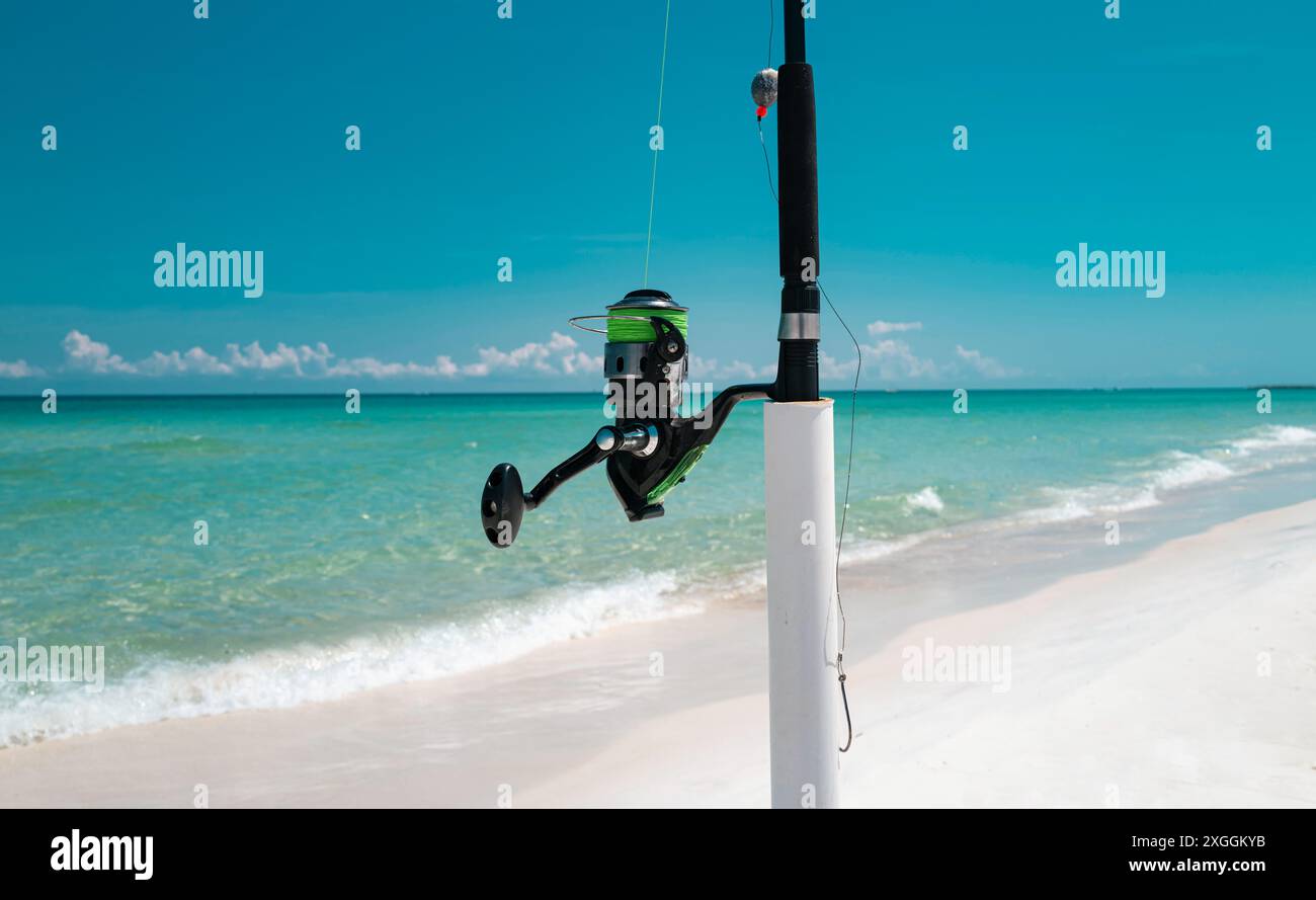 Fishing at ocean. Summer vacation concept. Fishing rod, spinner, fish ...