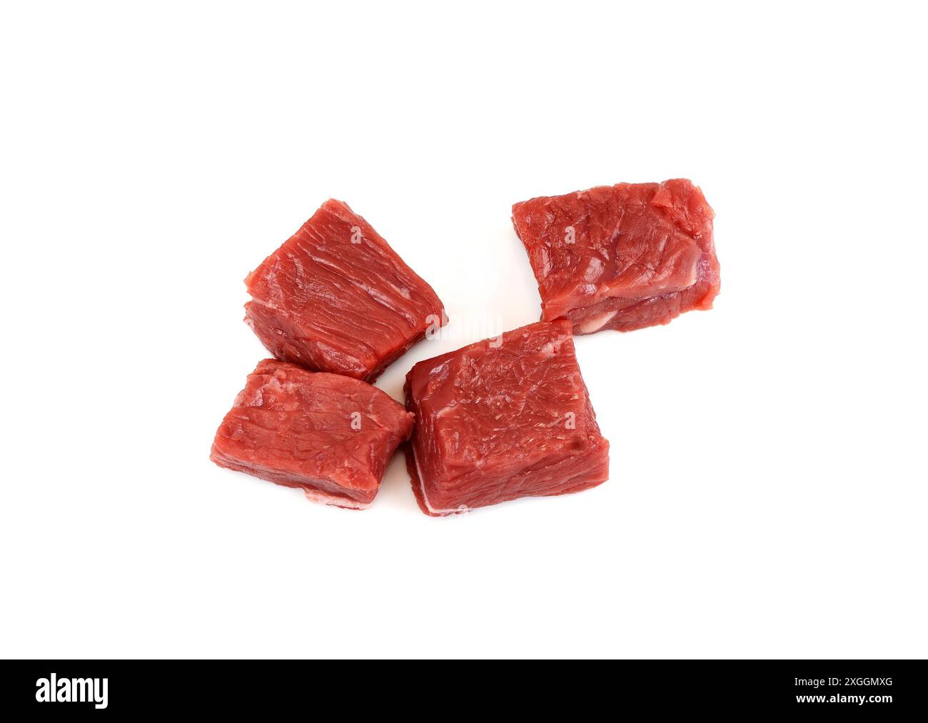 Pile of beef cubes isolated on white. raw diced beef meat ready for ...
