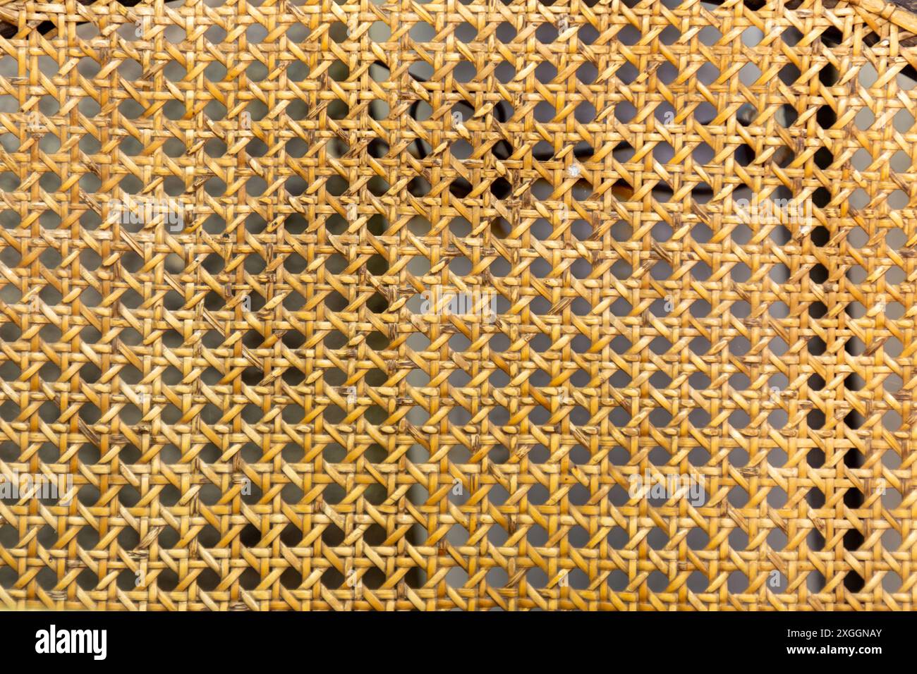 Close up texture of handwoven rattan in hexagonal pattern, vintage ...