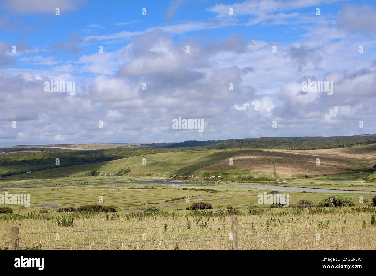 Hiking path overlooking the fields and river by the seven sisters ...
