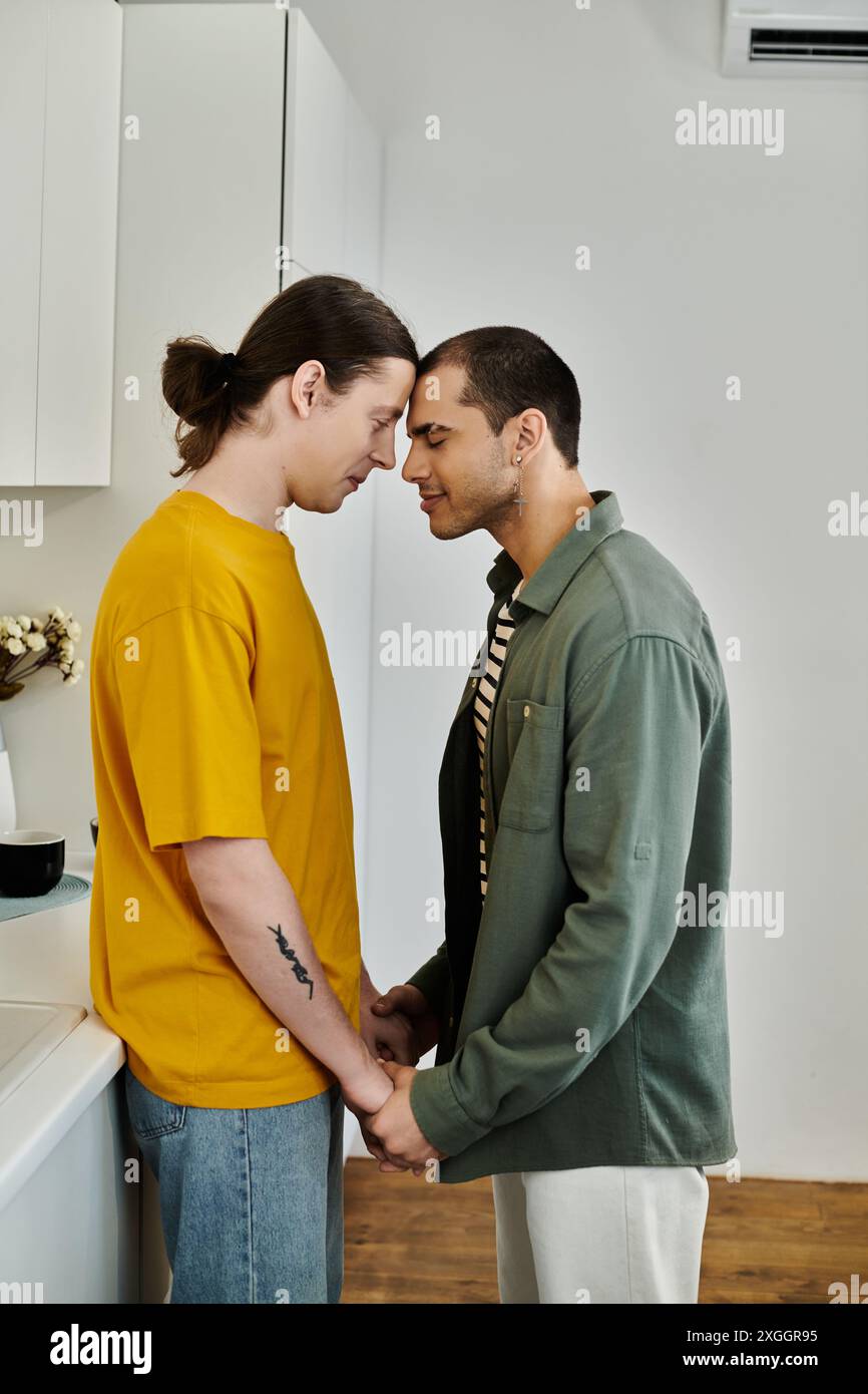 Two young men in casual attire stand close together in a modern ...