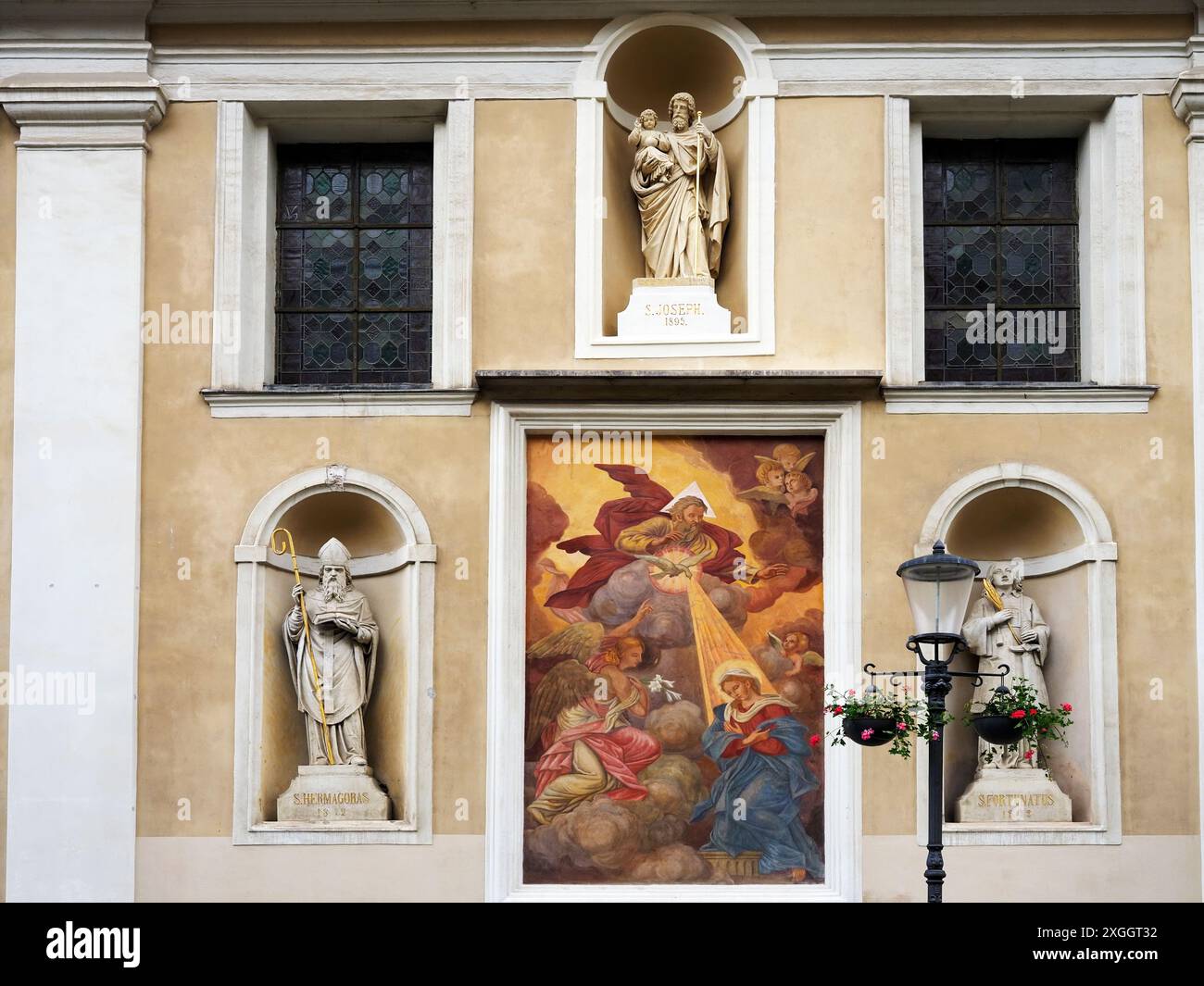 Mural and statues on the facade of Saint Nicholas Cathedral in ...