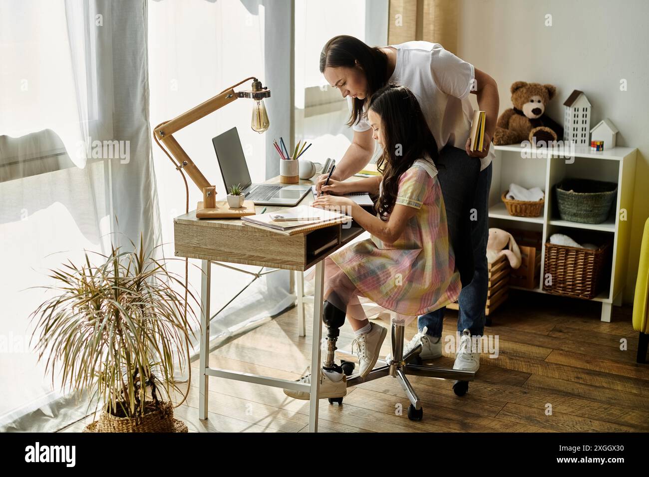 A Mother Helps Her Daughter With Her Schoolwork At Home The Girl Is