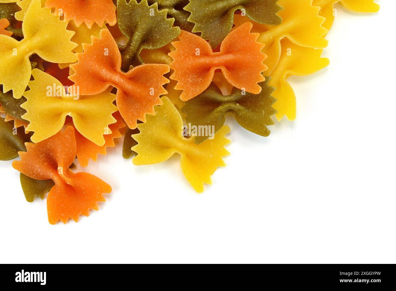 Multi-colored pasta in the form of bows. farfalle pasta Stock Photo - Alamy