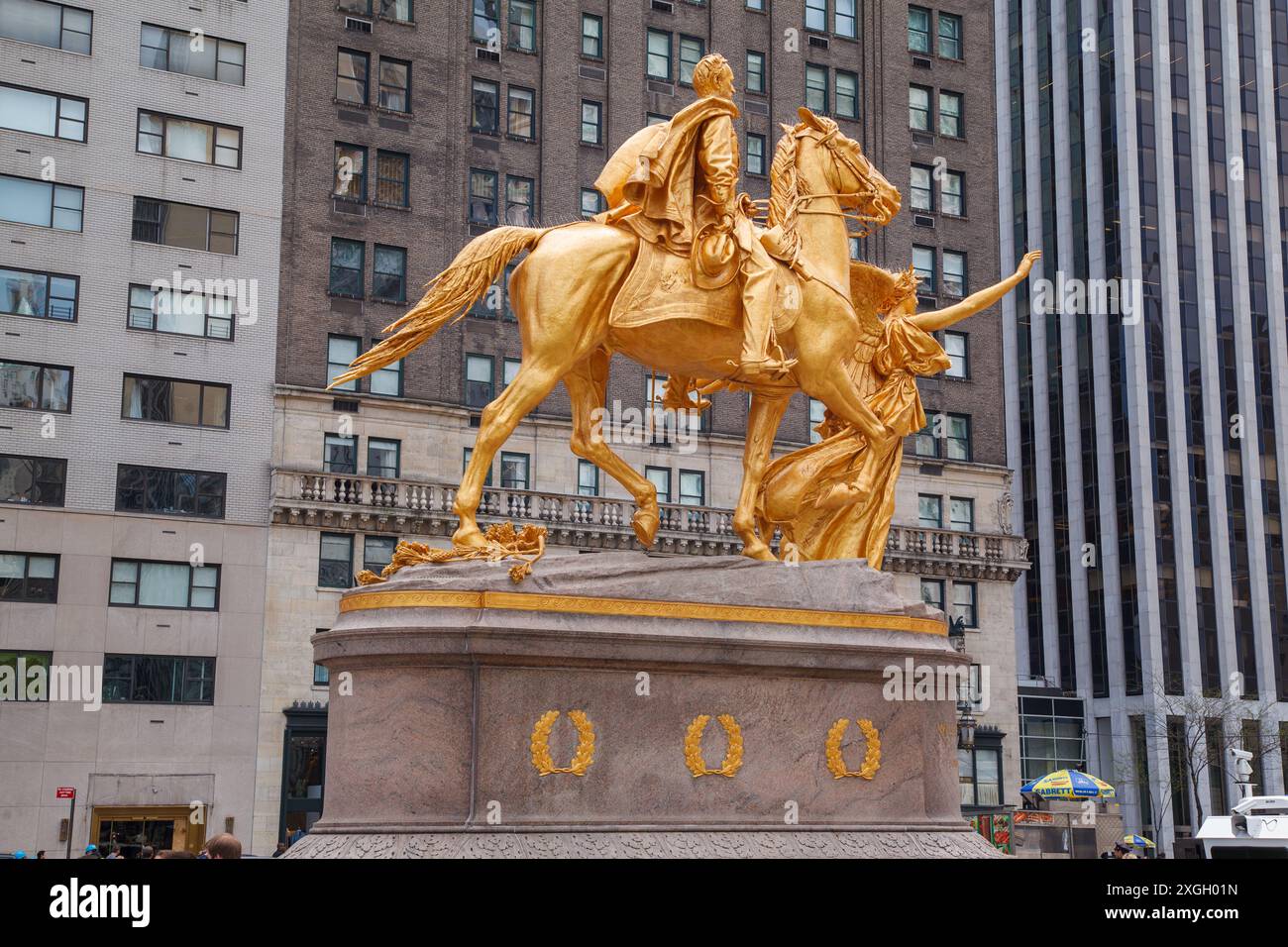 The golden monument of General William Tecumseh Sherman with a guiding ...