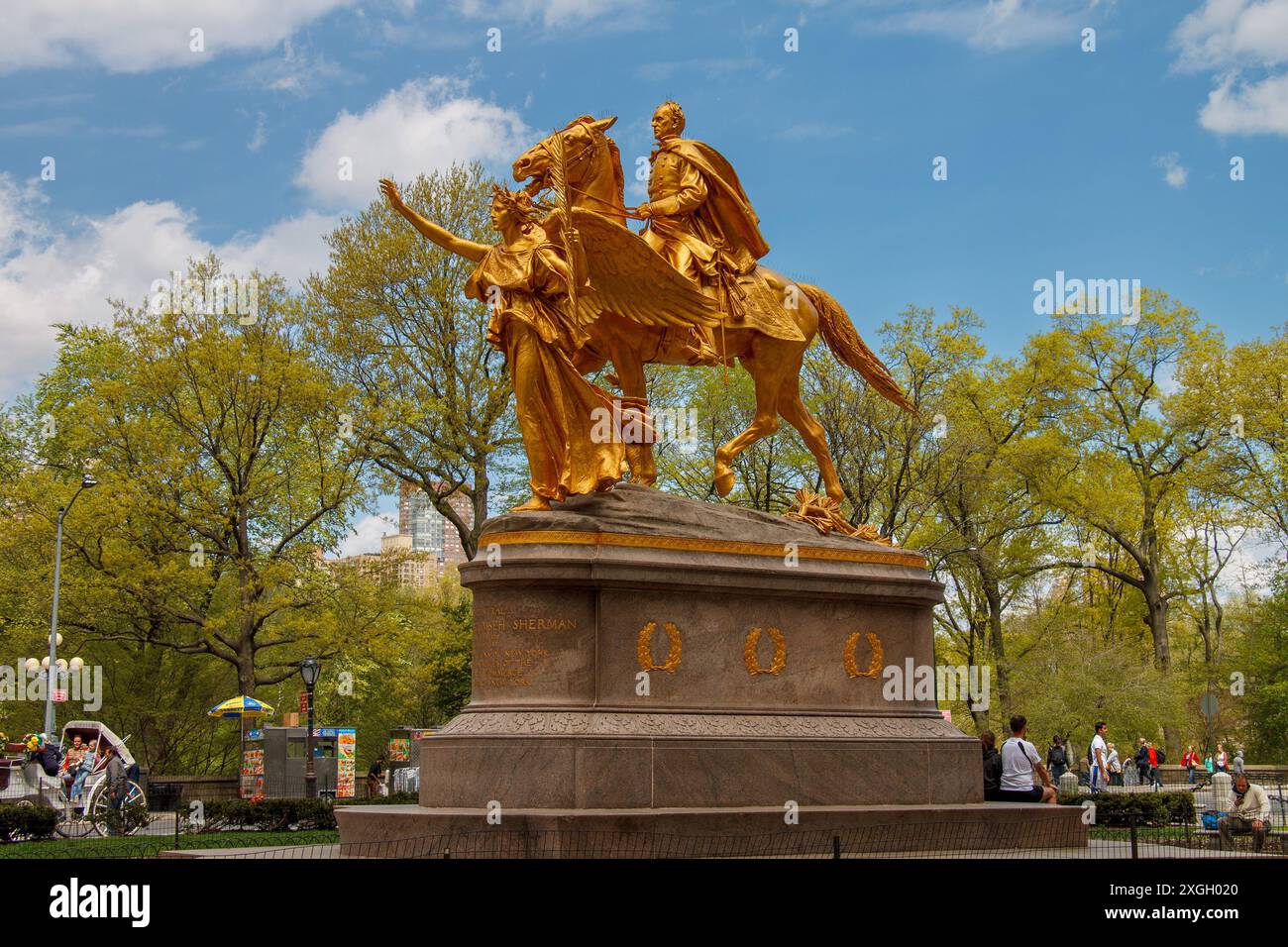 The golden monument of General William Tecumseh Sherman with a guiding ...