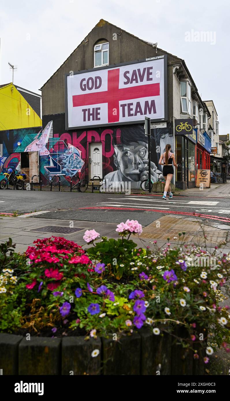 Brighton UK 9th July 2024 - A giant God Save The Team billboard by ...
