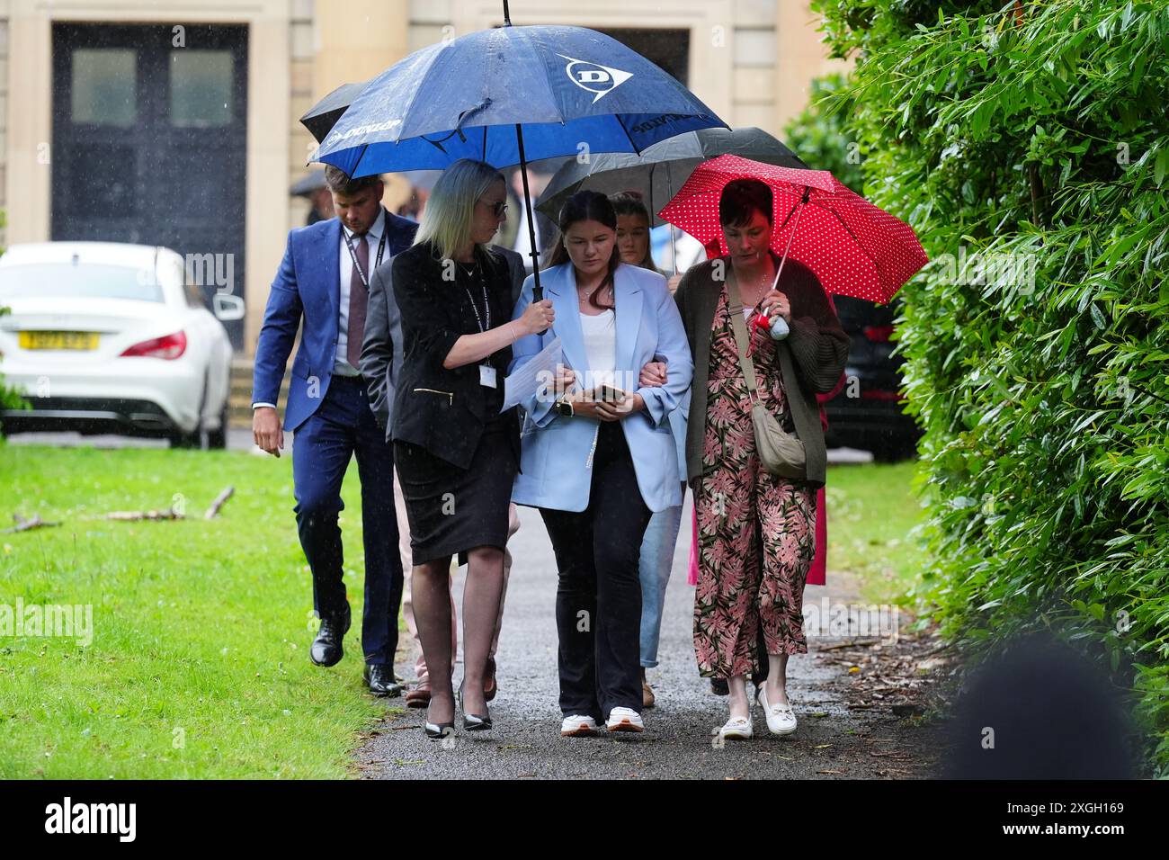 Sharlona Warner (centre), the mother of eight-month-old Zackary Blades ...