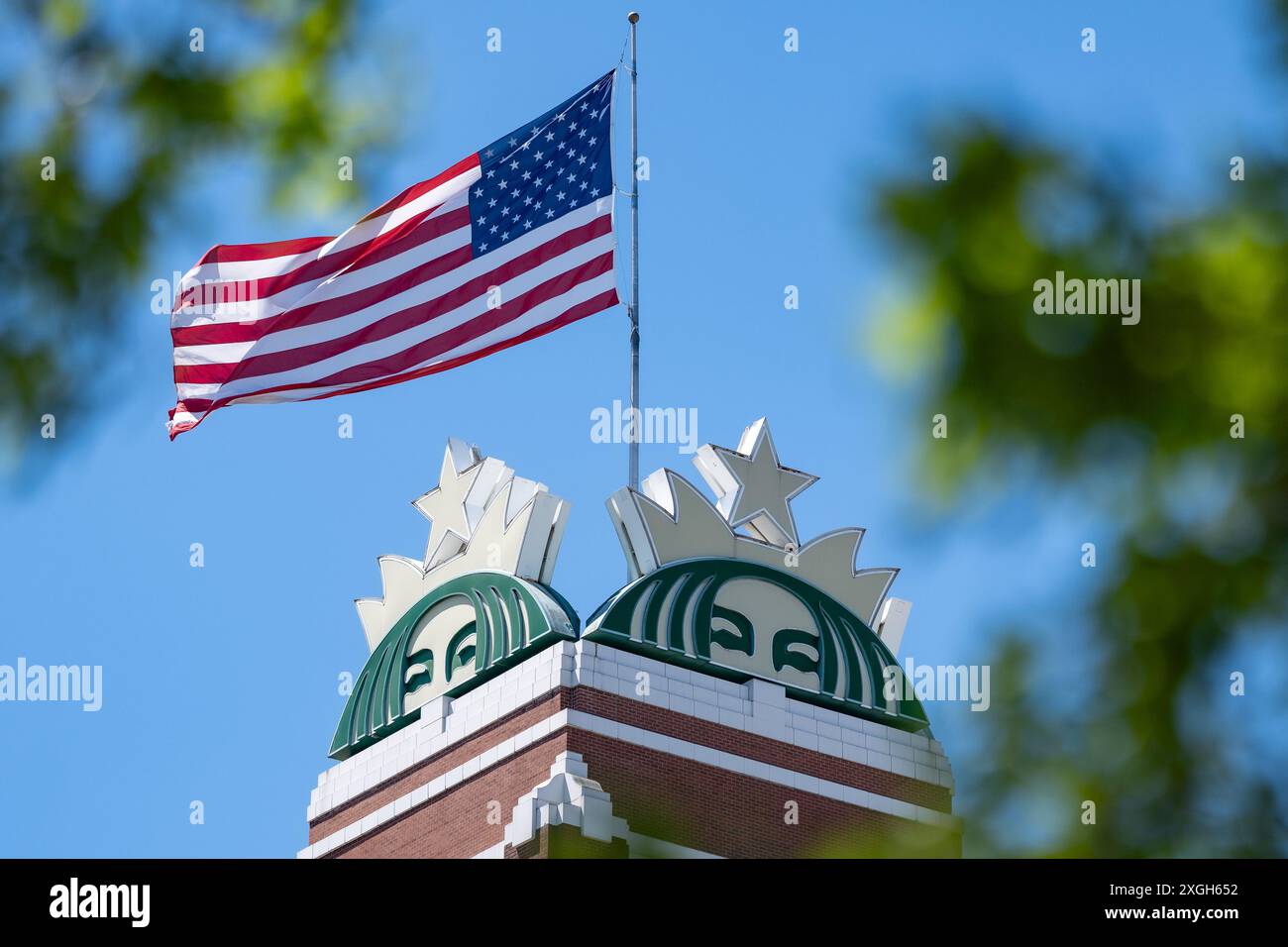 The Starbucks logo and an American flag are atop the Starbucks Support ...