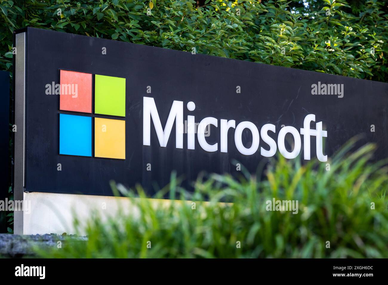 The Microsoft logo installed as a sign marks the edge of the the ...