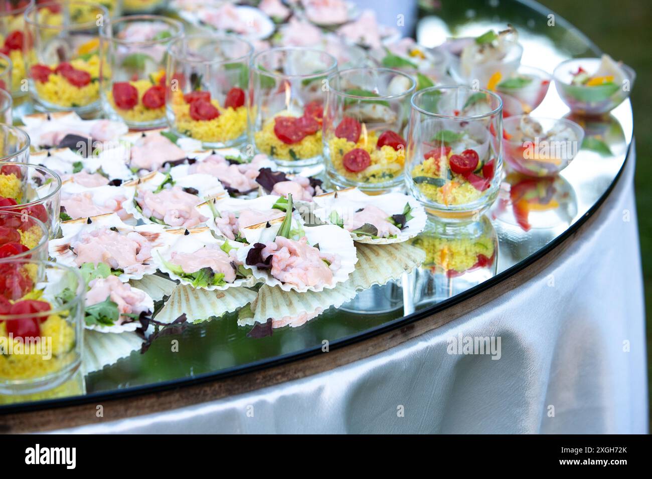 Beautiful wedding buffet table with various appetizers and colorful ...