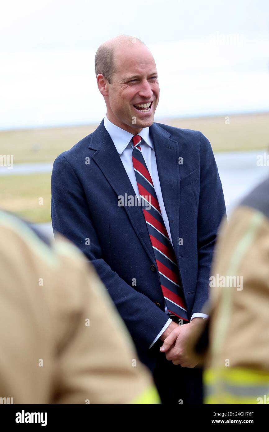 The Prince of Wales, Royal Honorary Air Commodore, RAF Valley, talks to ...
