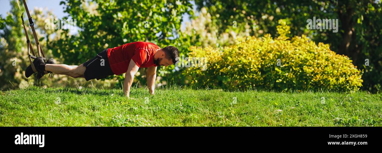 Strong young athlete doing plank hi-res stock photography and images ...