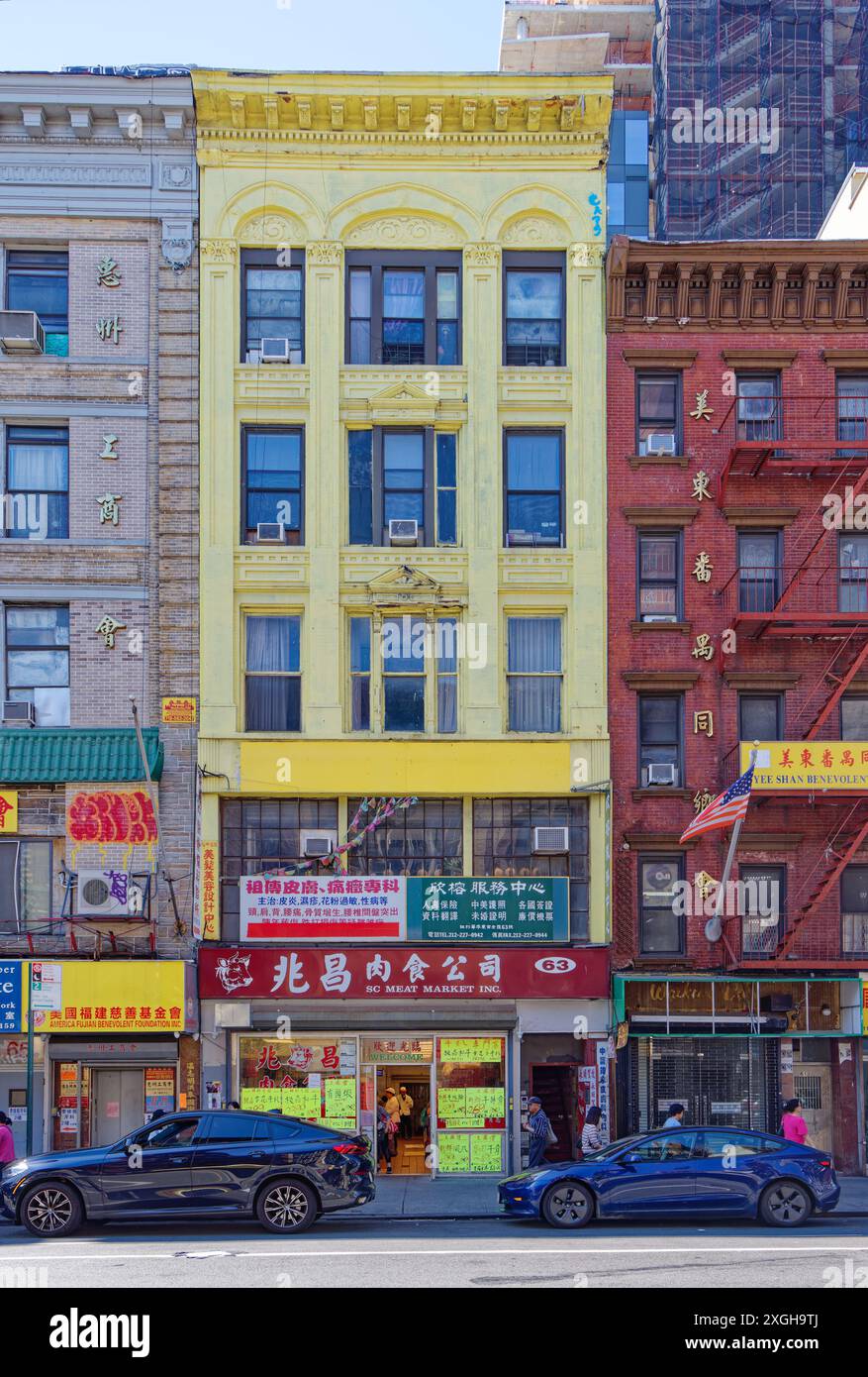 NYC Chinatown: 63 East Broadway is a five-story yellow-painted brick ...