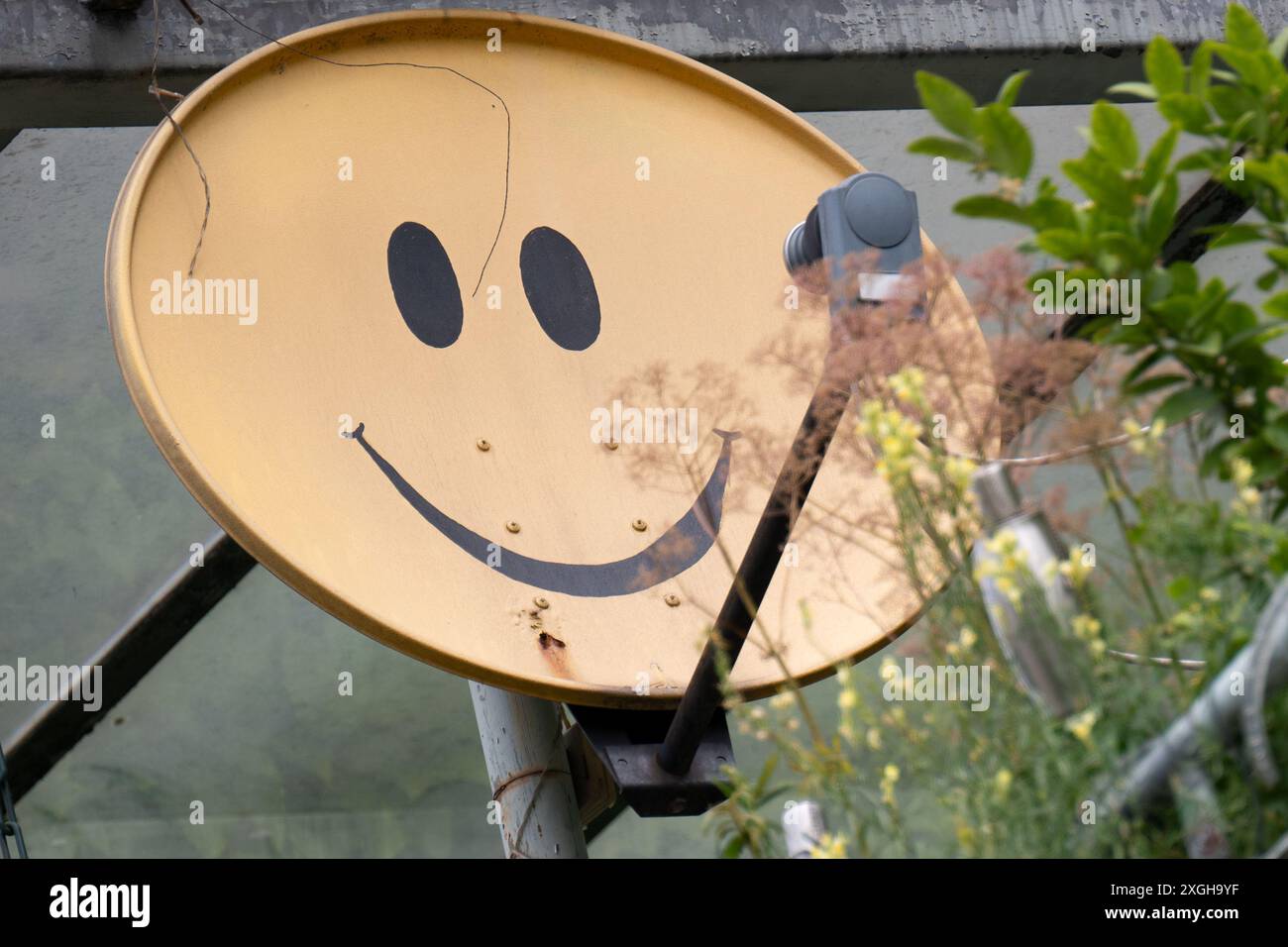 Berlin, Germany. 05th July, 2024. A satellite dish for TV reception is ...