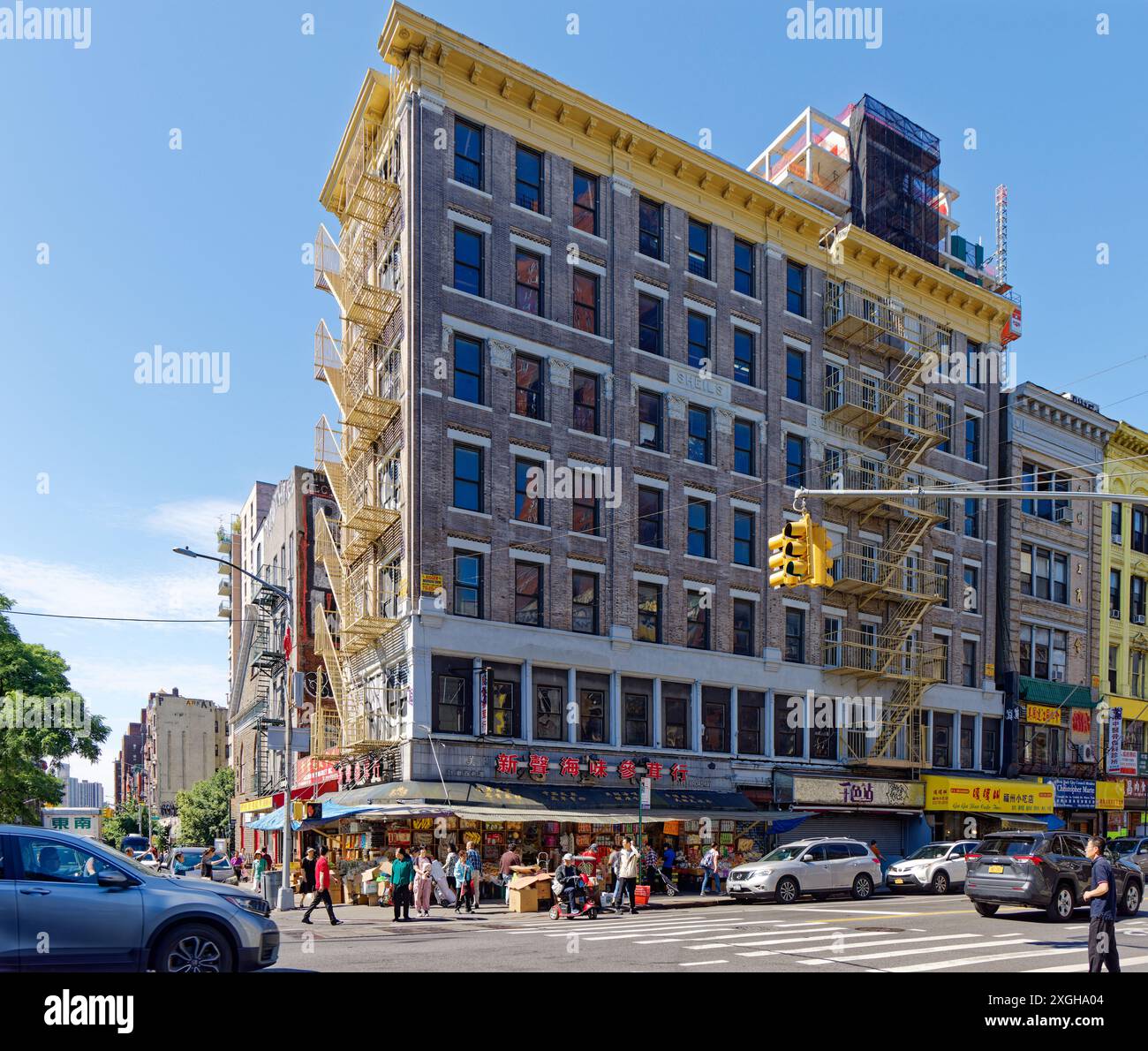 NYC Chinatown: Sheils Building, 67-73 East Broadway, is a seven-story ...