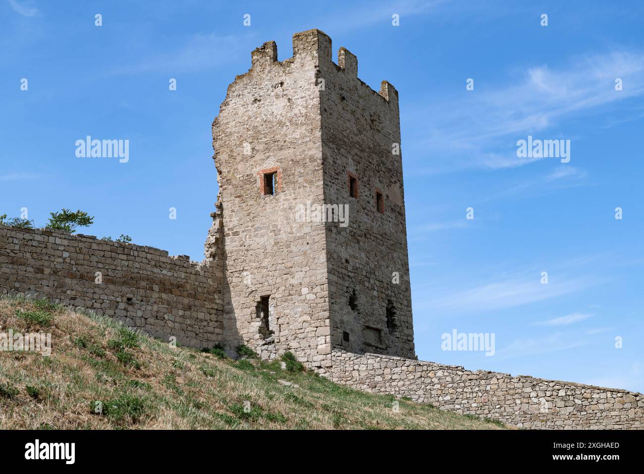 Ancient defensive tower of the ancient Genoese fortress on a sunny May ...