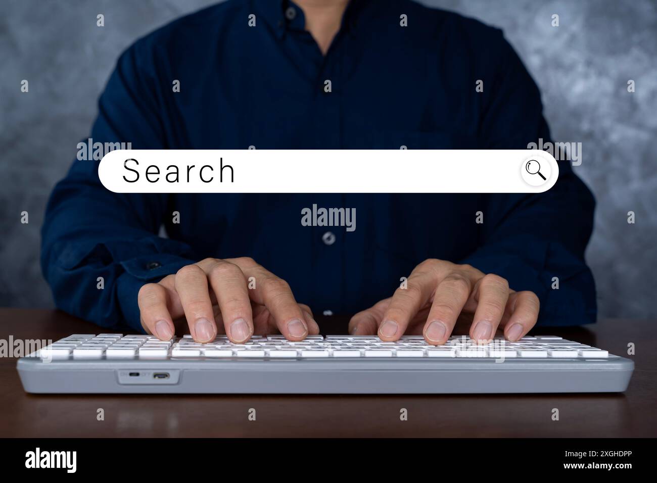 The user is typing a keyboard with a hologram search box. Searching ...