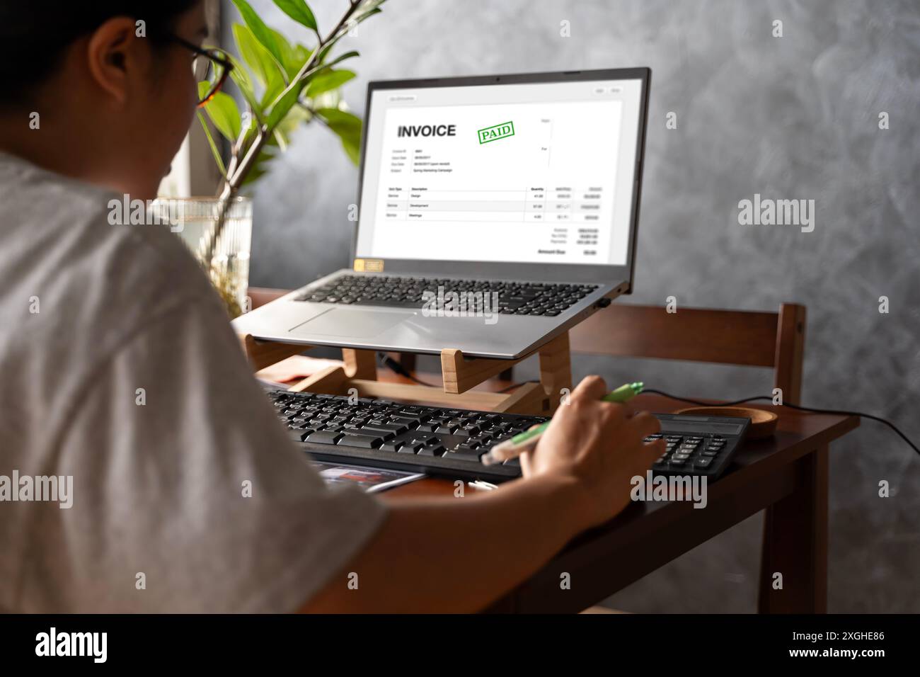 Accountant calculating receipt hi-res stock photography and images - Alamy