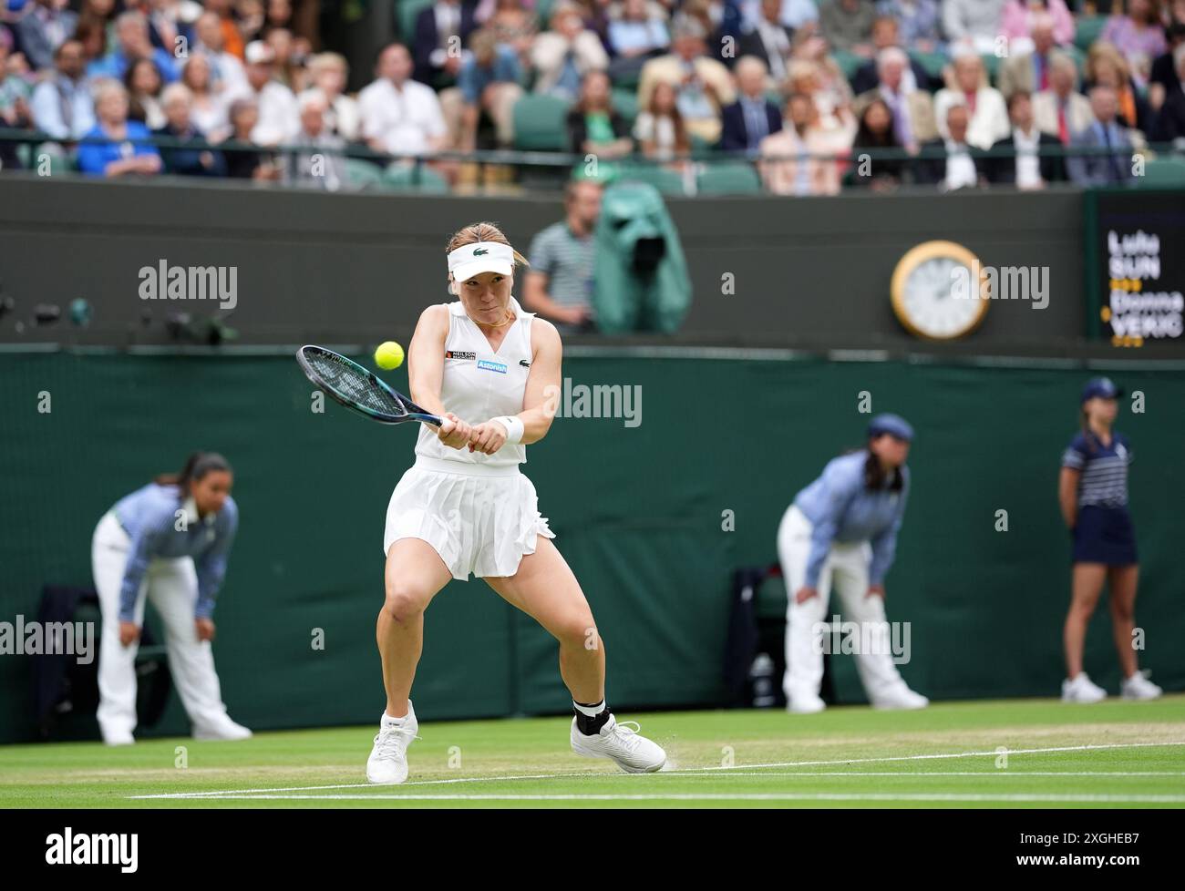 Lulu Sun in action against Donna Vekic (not pictured) on day nine of ...