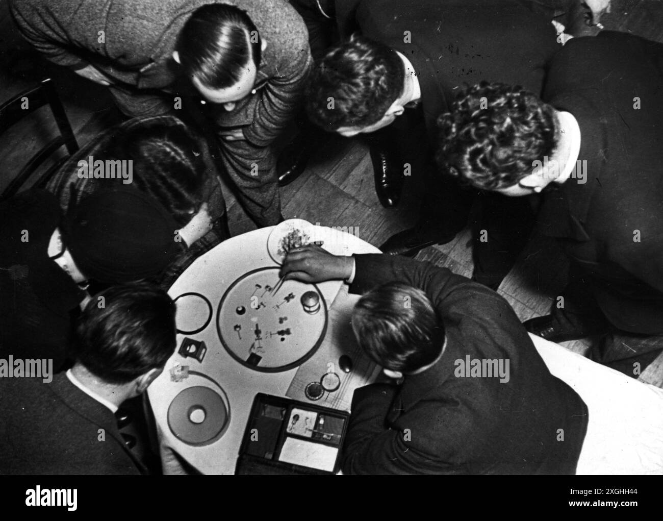 circus, flea circus, interior view, viewers at show, 1950s, ADDITIONAL ...
