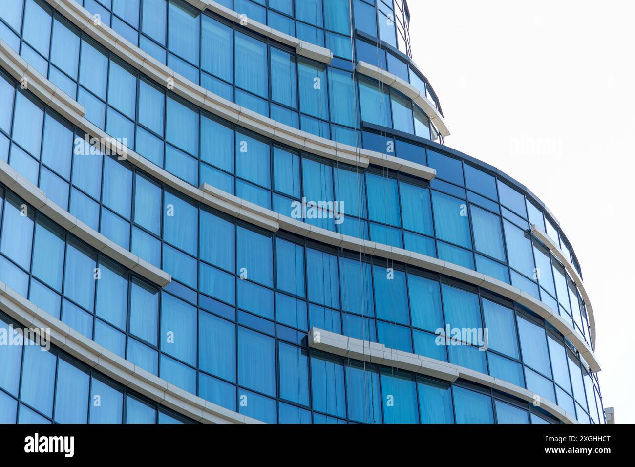 Building facade detail pattern with layers of windows, modern urban ...