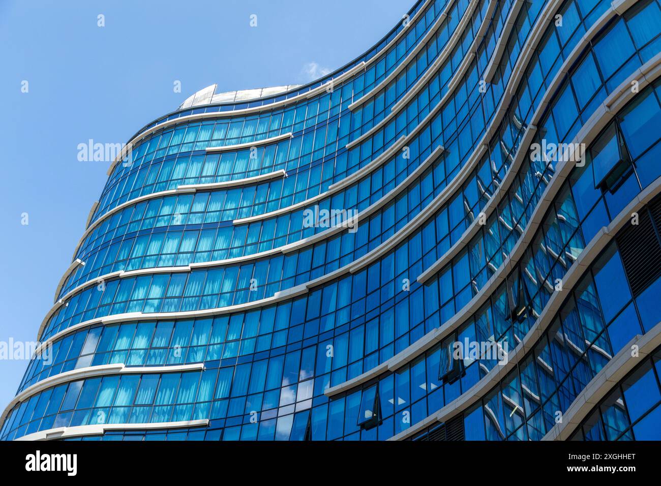 Building facade detail pattern with layers of windows, modern urban ...