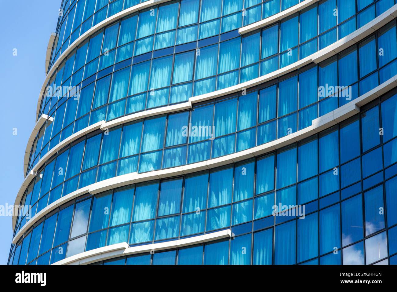 Building facade detail pattern with layers of windows, modern urban ...