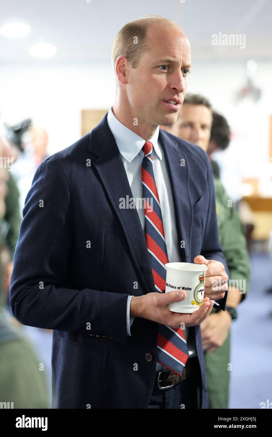 The Prince of Wales, Royal Honorary Air Commodore, RAF Valley, talks to ...