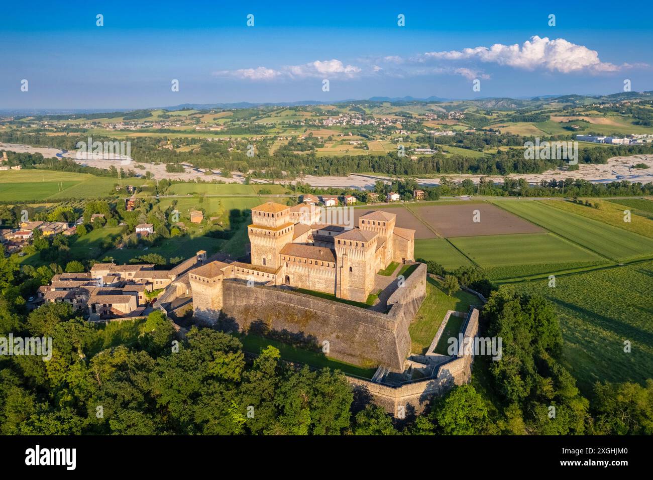 Aerial view of castle of Torrechiara during a summer sunset. Langhirano ...