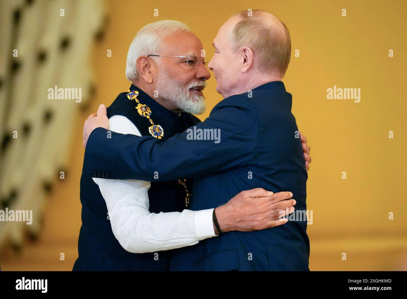 Russian President Vladimir Putin, right, awards Indian Prime Minister ...