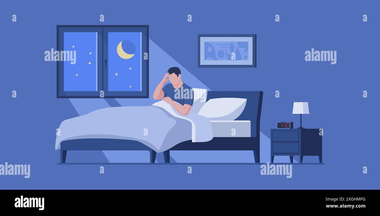 Exhausted man suffering from insomnia, he is awake and lying in bed ...